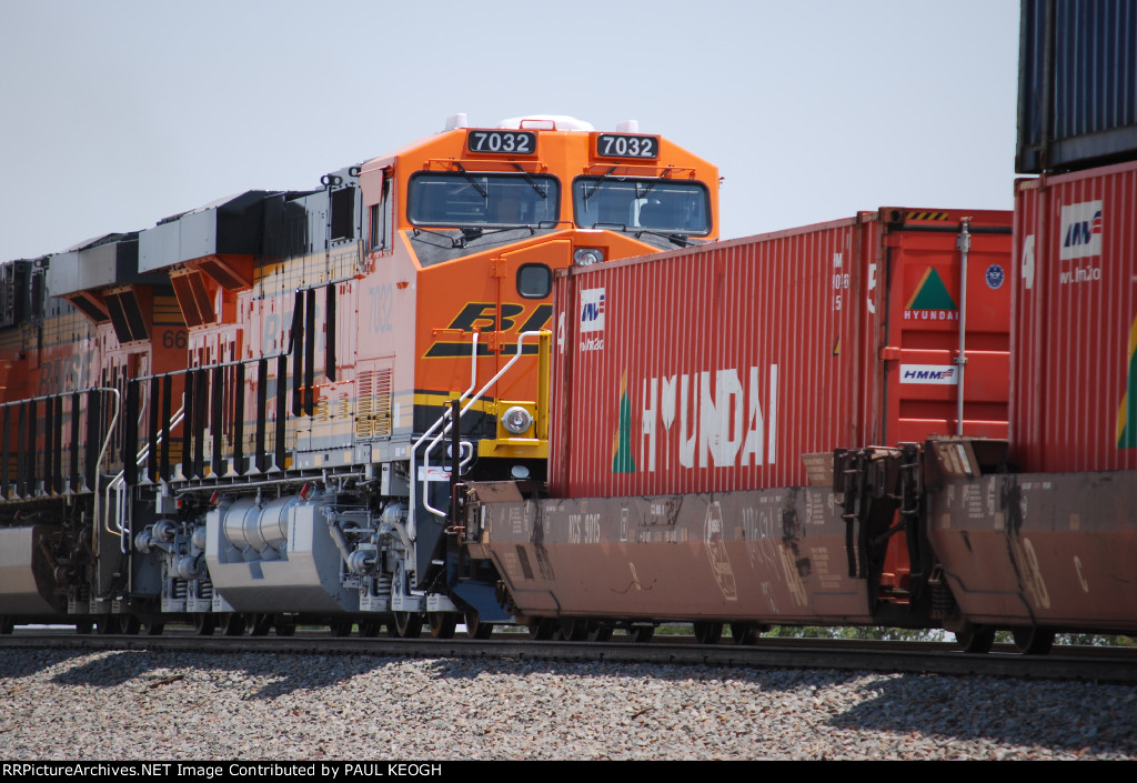 BNSF 7032 heads west as the Lead Rear DPU on Her First Run West.